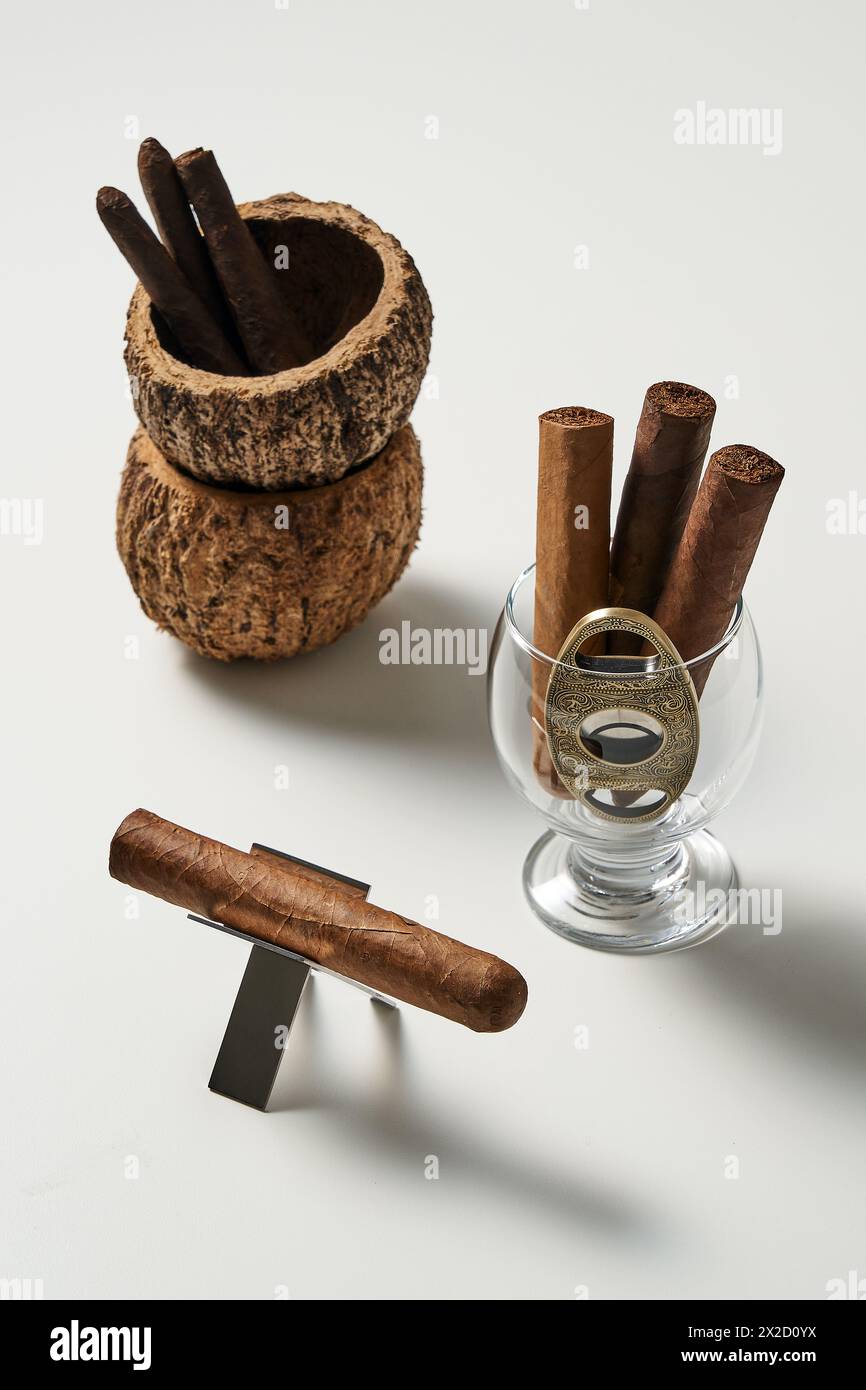 a cigar and match in a woodball Stock Photo - Alamy