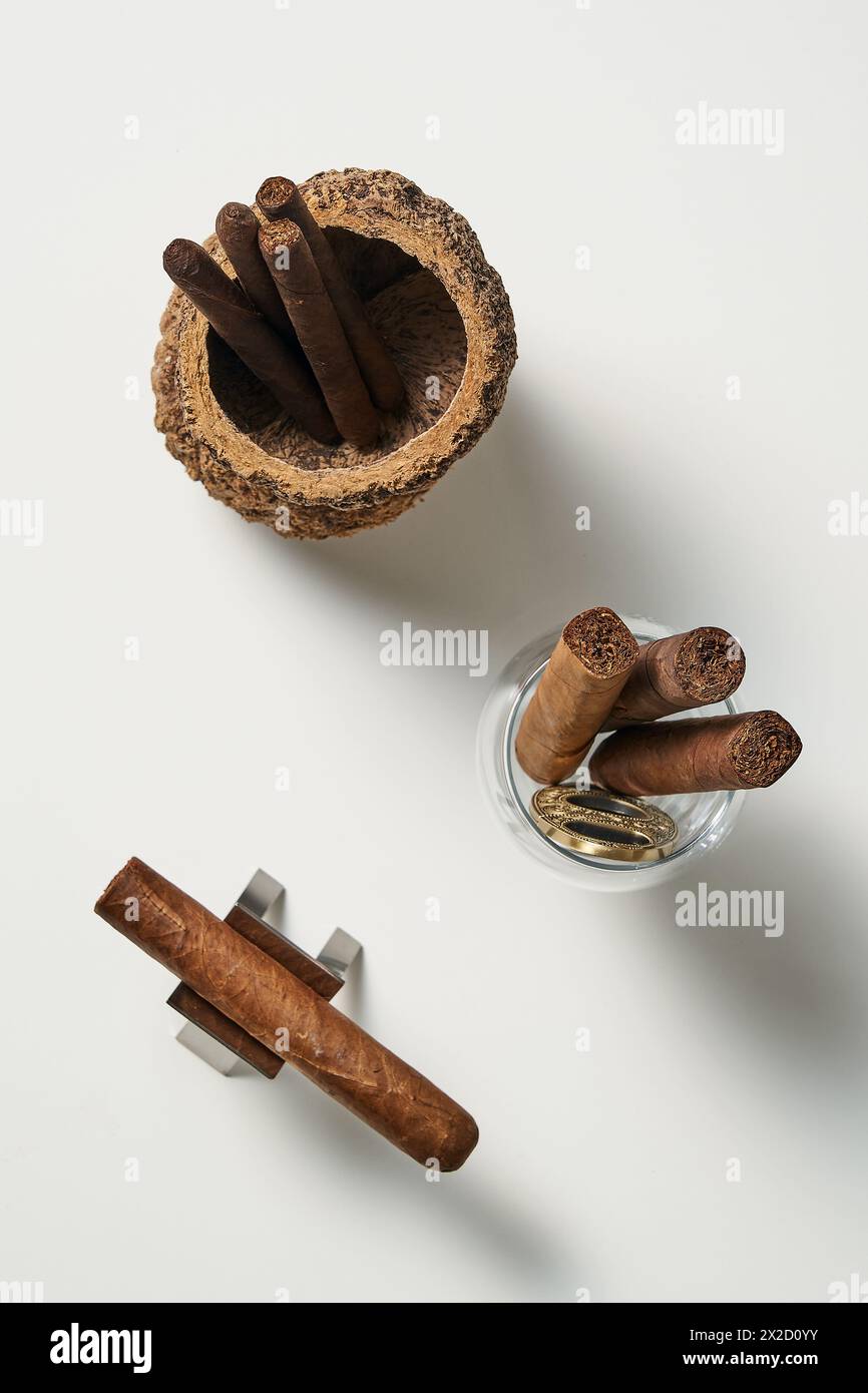 a cigar and match in a woodball Stock Photo - Alamy