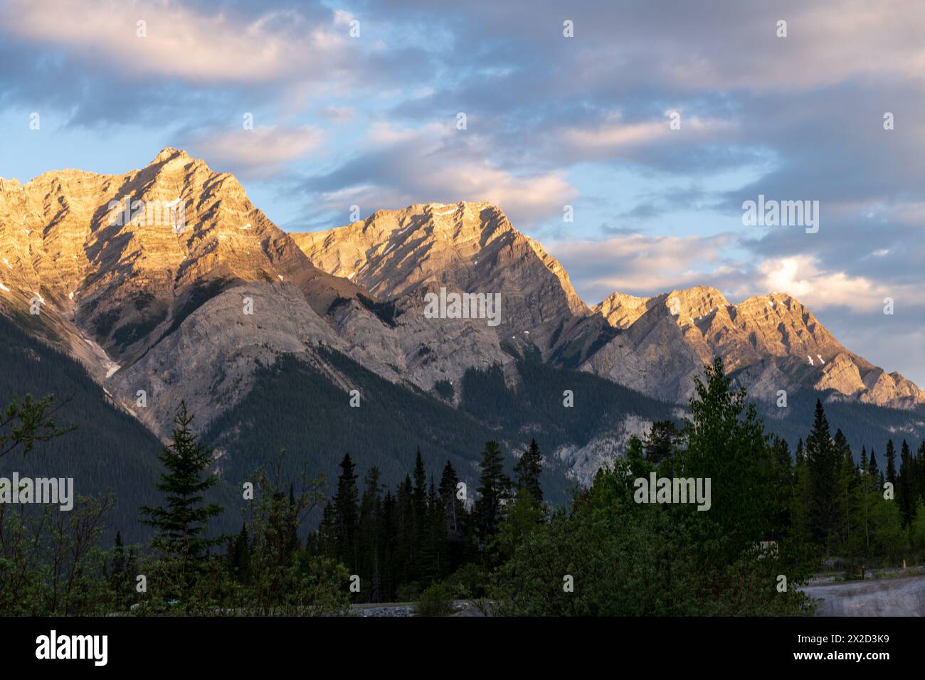 Incredible view of Three Sisters in Canada, Banff National Park with mountains reflecting in ...