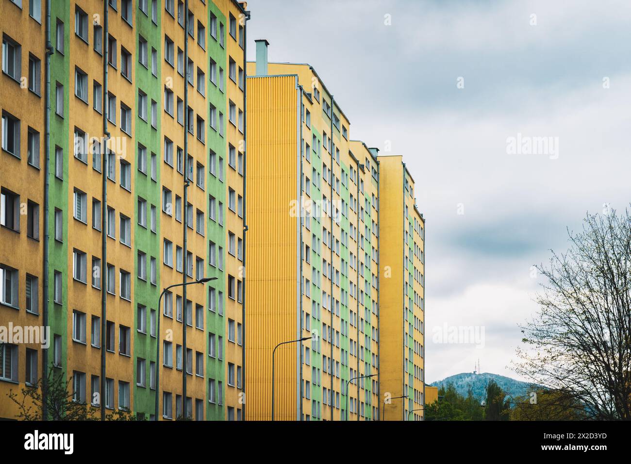Two modern tall buildings towering next to each other in an urban ...