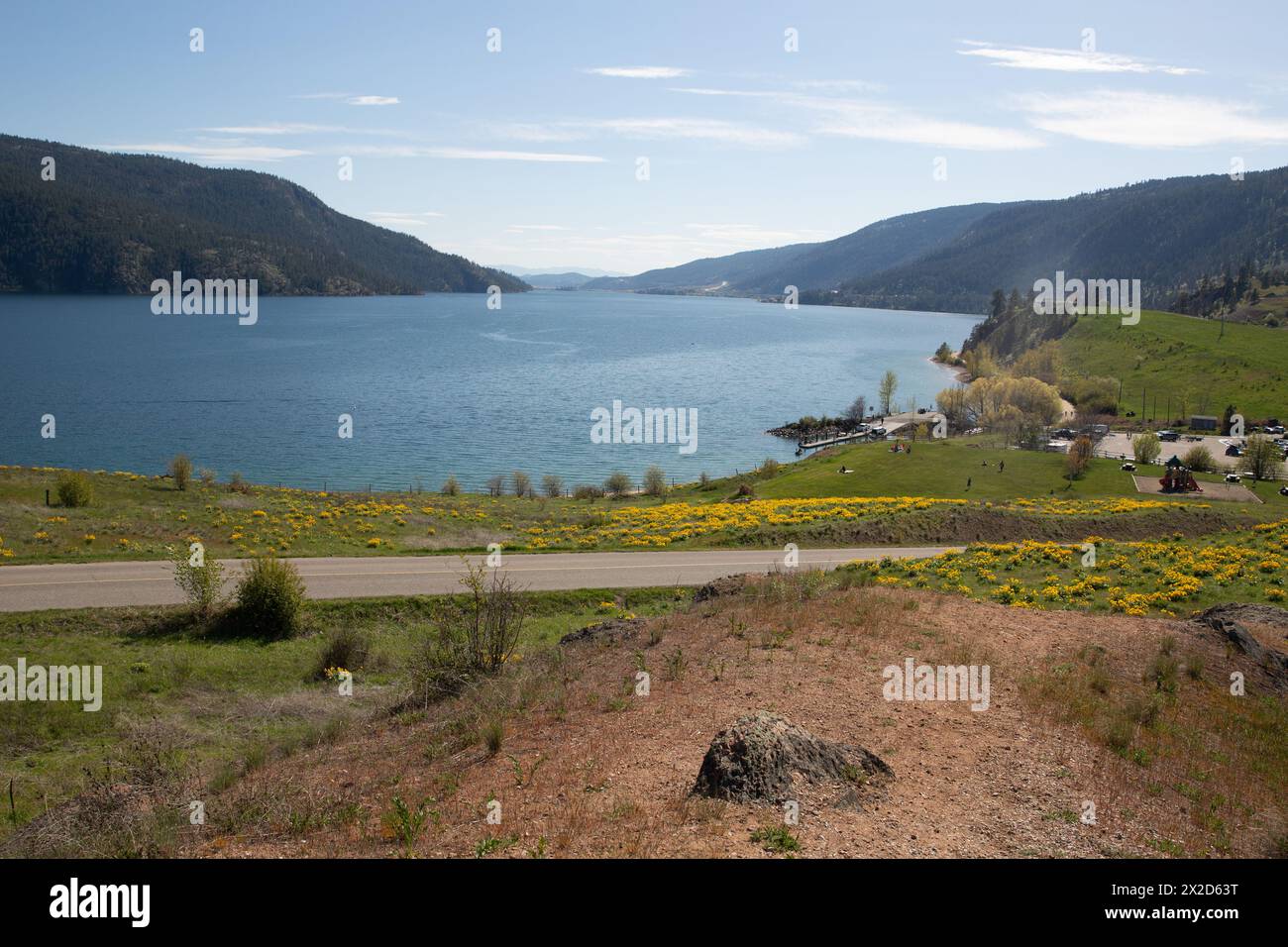 Road with Kalamalka lake in the background Stock Photo - Alamy