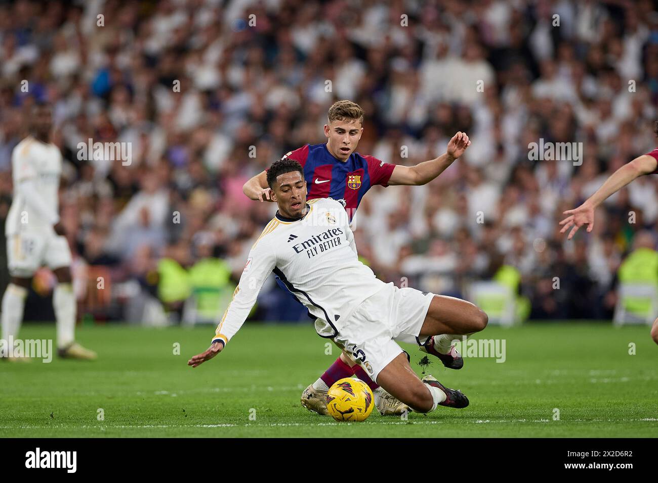 Madrid, Spain. 21st Apr, 2024. Fermin Lopez (R) of FC Barcelona and ...