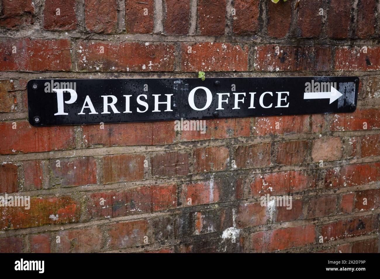 Sign pointing to the Parish Office Stock Photo - Alamy