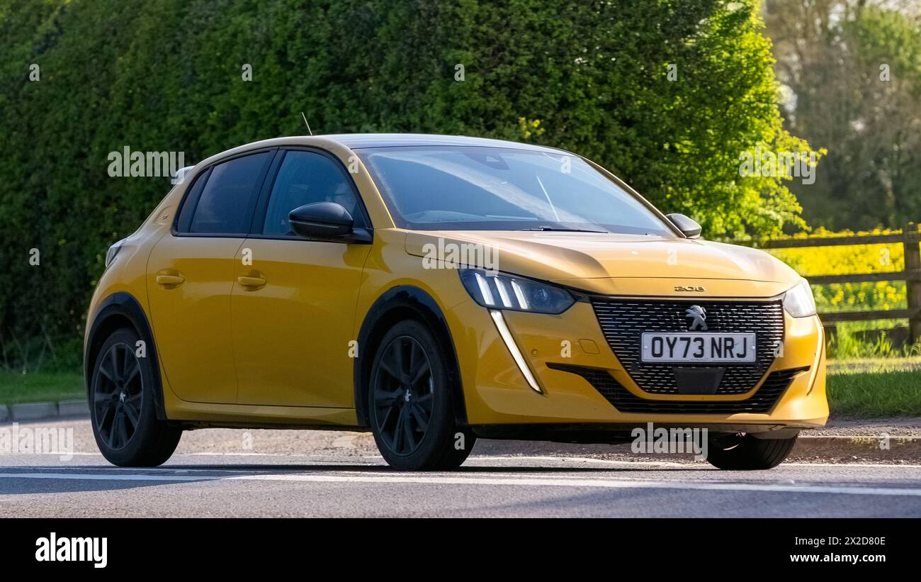 Bicester,UK- Apr 21st2024: 2023 yellow Peugeot 208 gt classic car ...