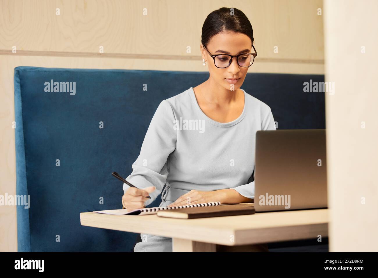 Secretary, laptop or businesswoman with notebook or schedule for daily ...