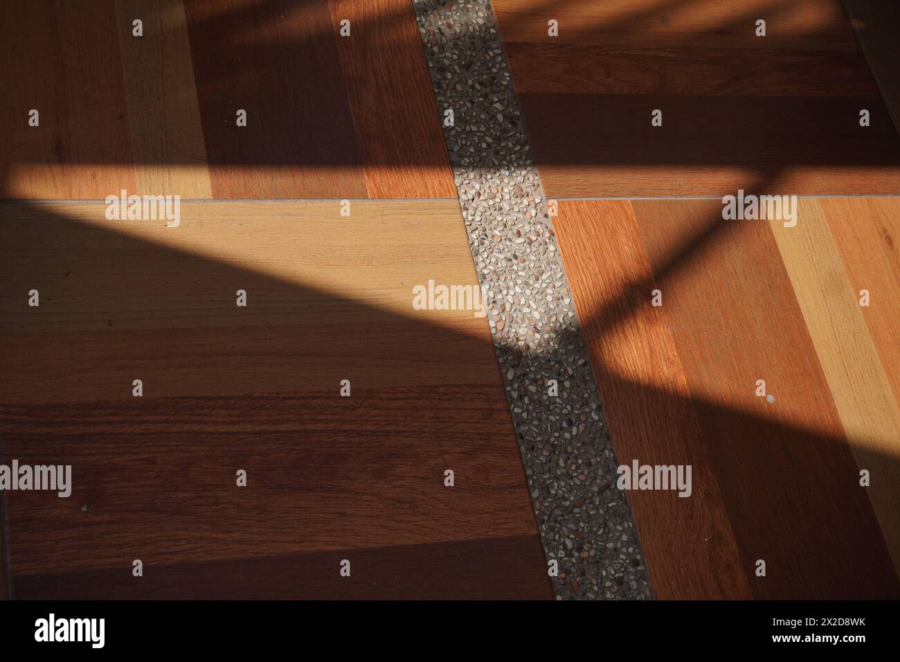 Triangular shadows and lines from the afternoon sun hitting the surface ...