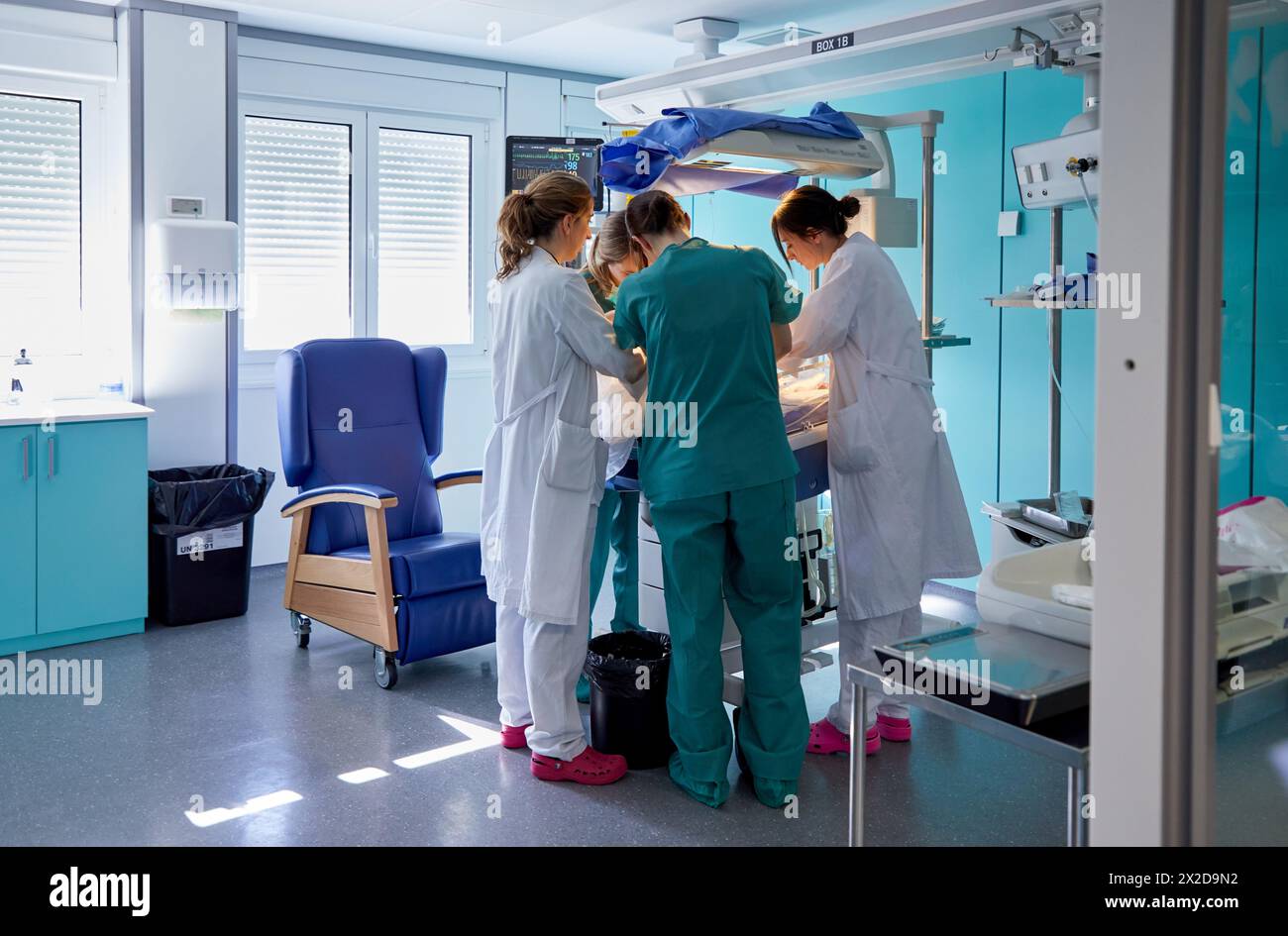 Team of doctors and nurses attending to a baby, Neonatal pediatrics ...