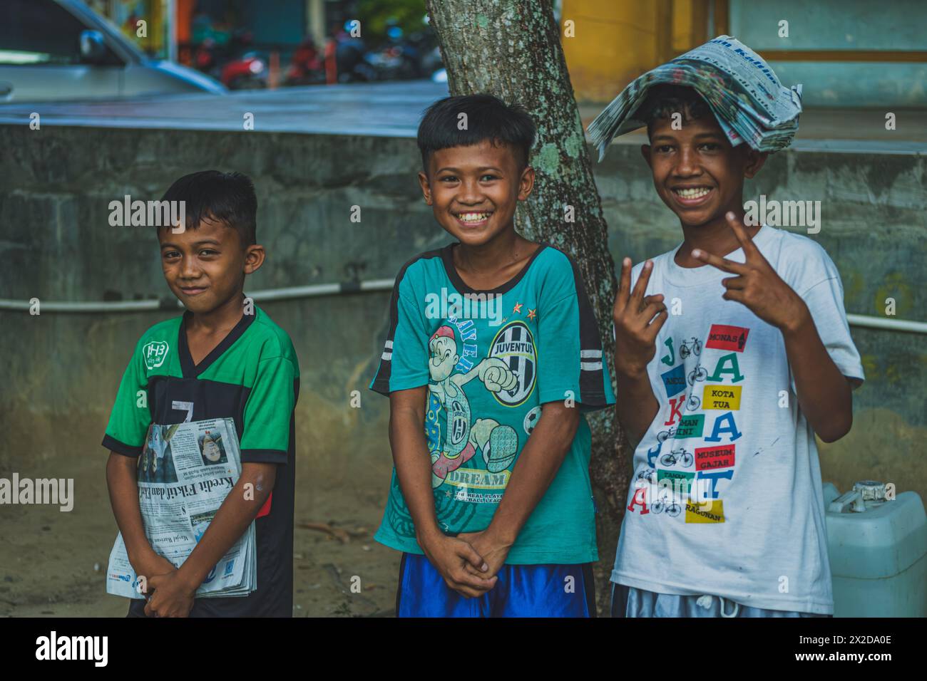 Balikpapan, Indonesia - April 12th, 2024. they still smile even though ...