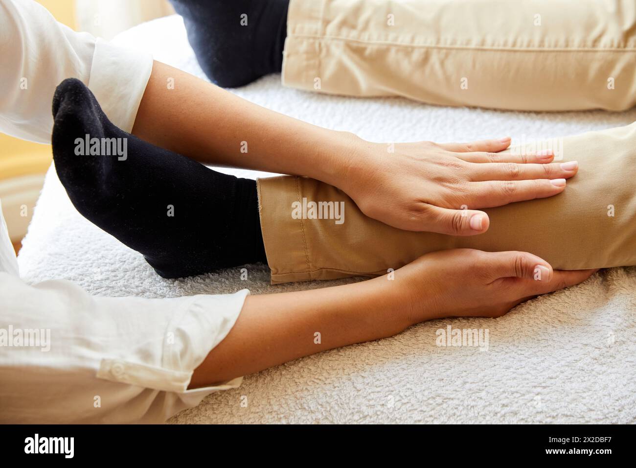 Osteopathy. Osteopath manipulating a patient Stock Photo - Alamy