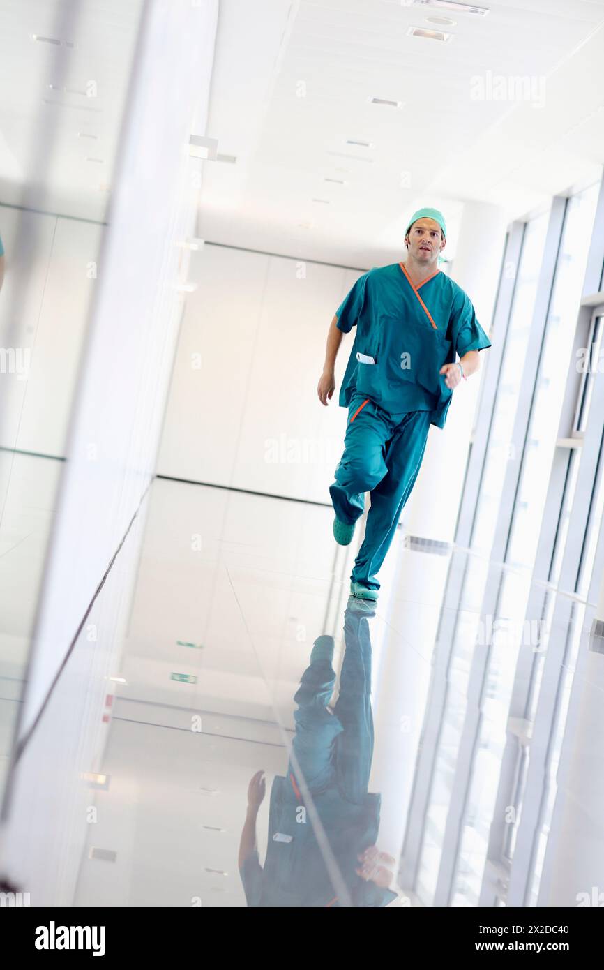 running surgeon in the operating room hallway, Onkologikoa Hospital ...
