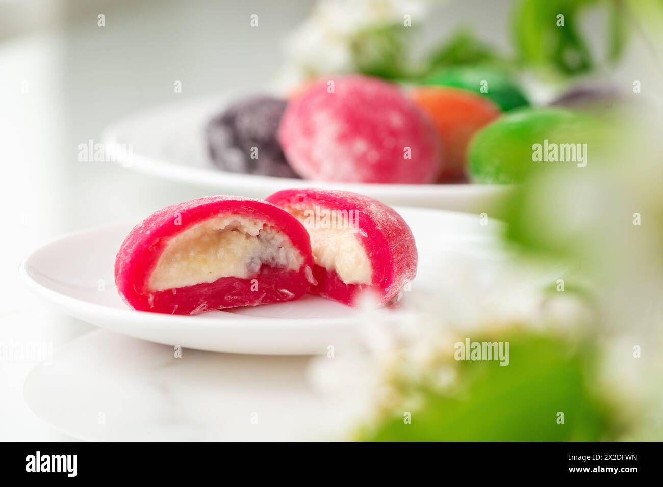 Multi-colored Japanese cakes Mochi in a white plate Stock Photo - Alamy