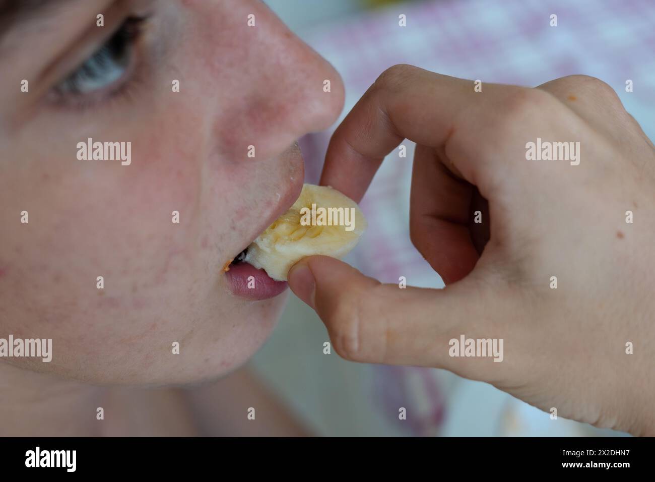 Boy biting lip hi-res stock photography and images - Alamy