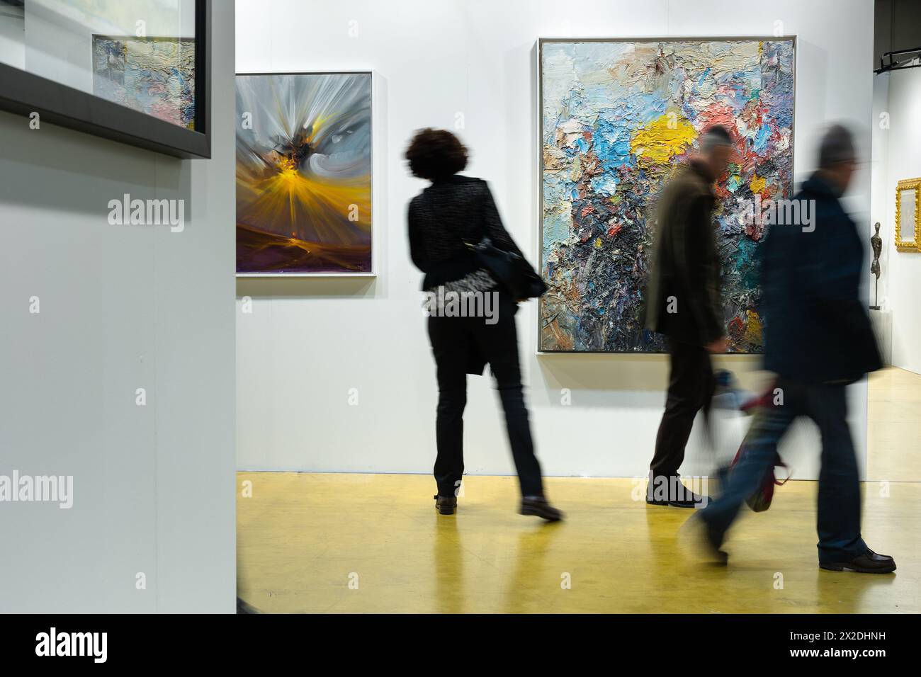 People Walking and Admiring Paintings in a Modern Art Gallery Stock ...