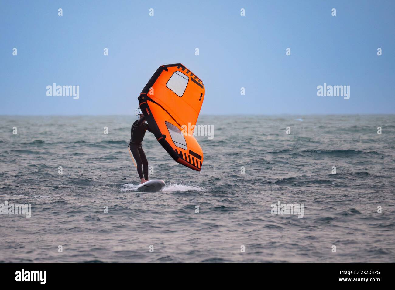 Wing Surfing or WingFoiling During a Windy Day Stock Photo - Alamy