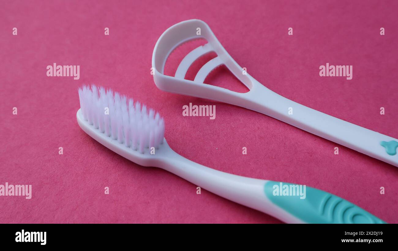 Set of Toothbrush and Tongue cleaner. Dental care products Stock Photo ...