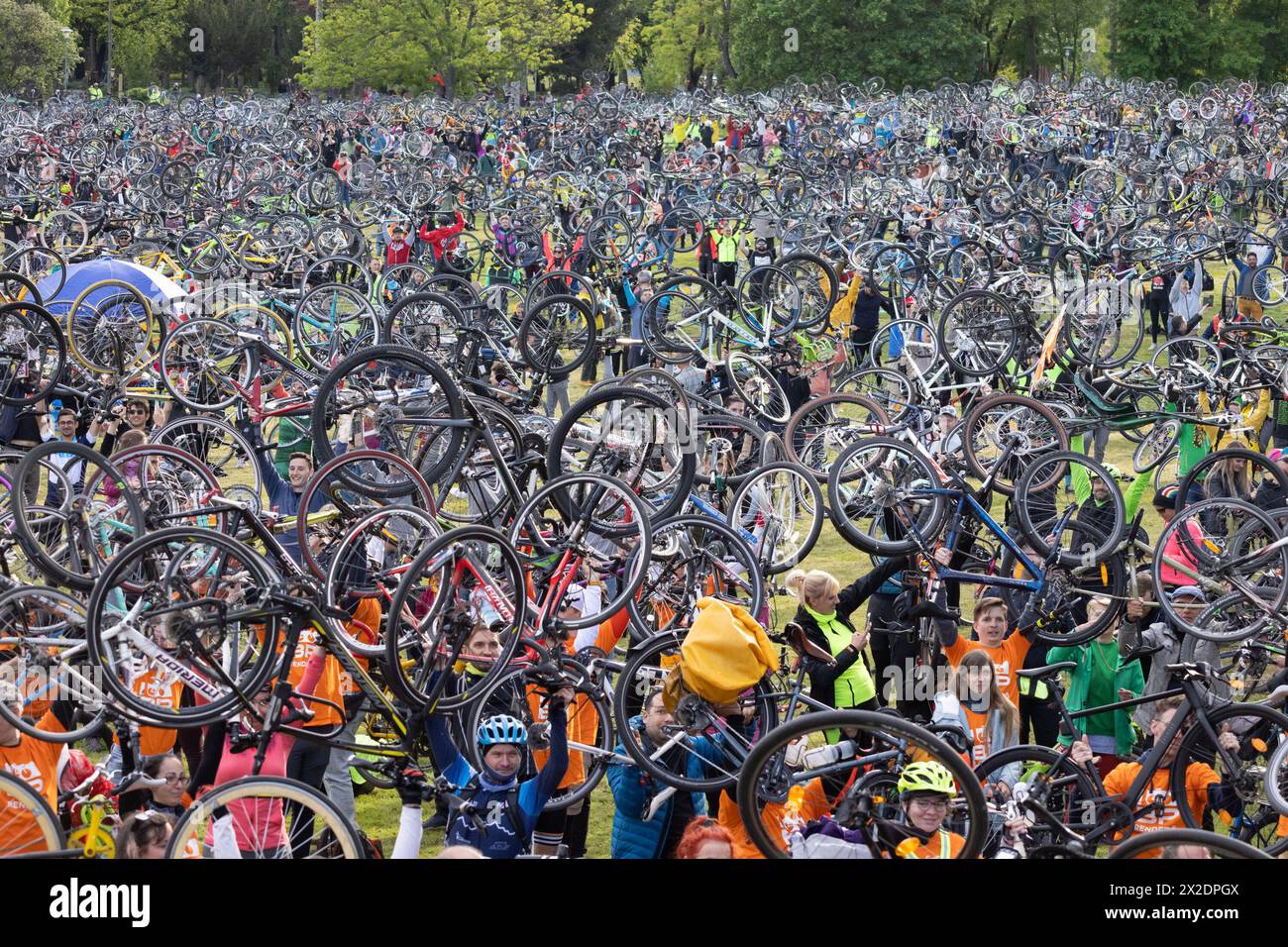 Beijing, Hungary. 20th Apr, 2024. People lift their bikes during the I ...
