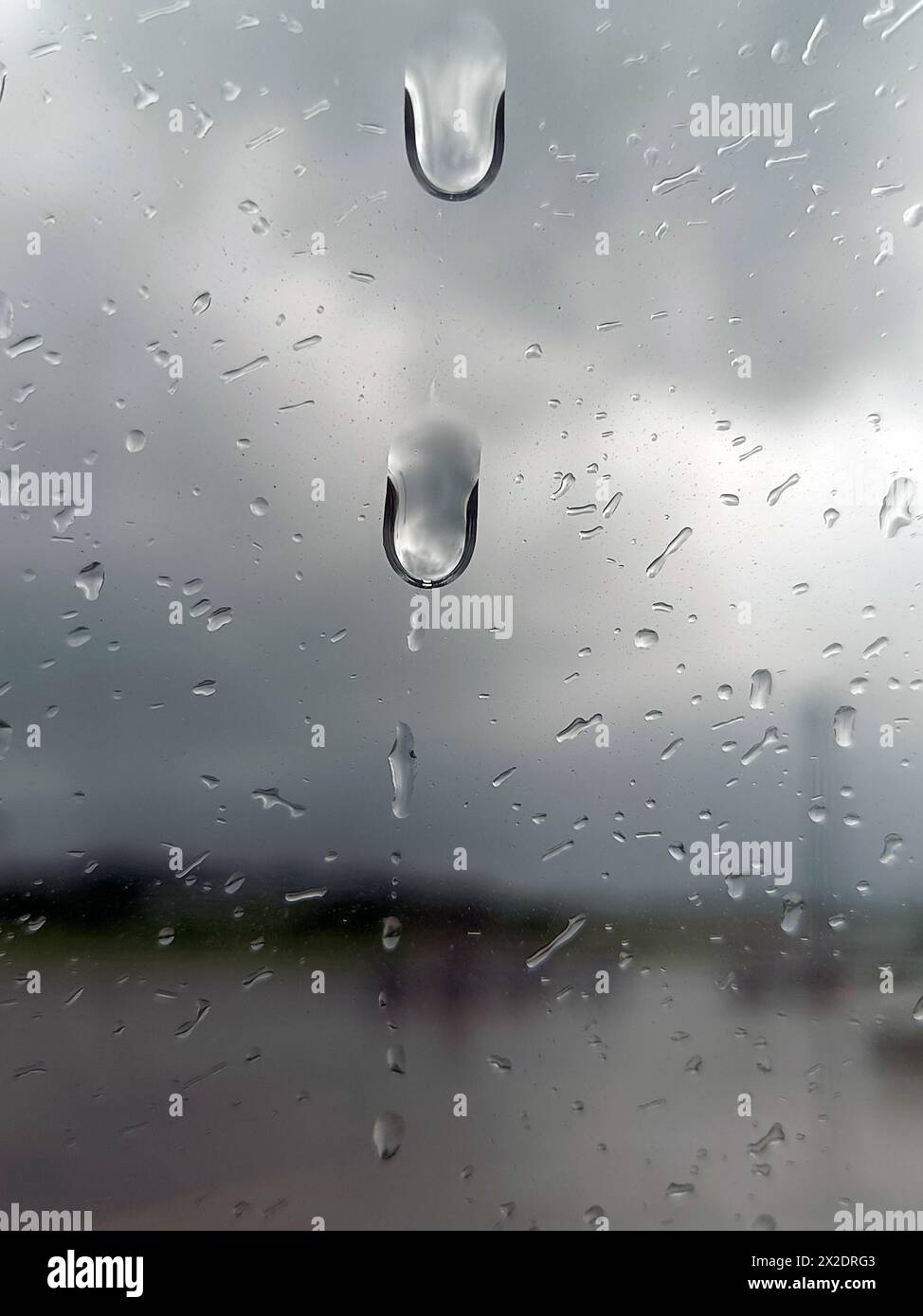 raindrops dripping on an aircraft window. selective focus Stock Photo ...