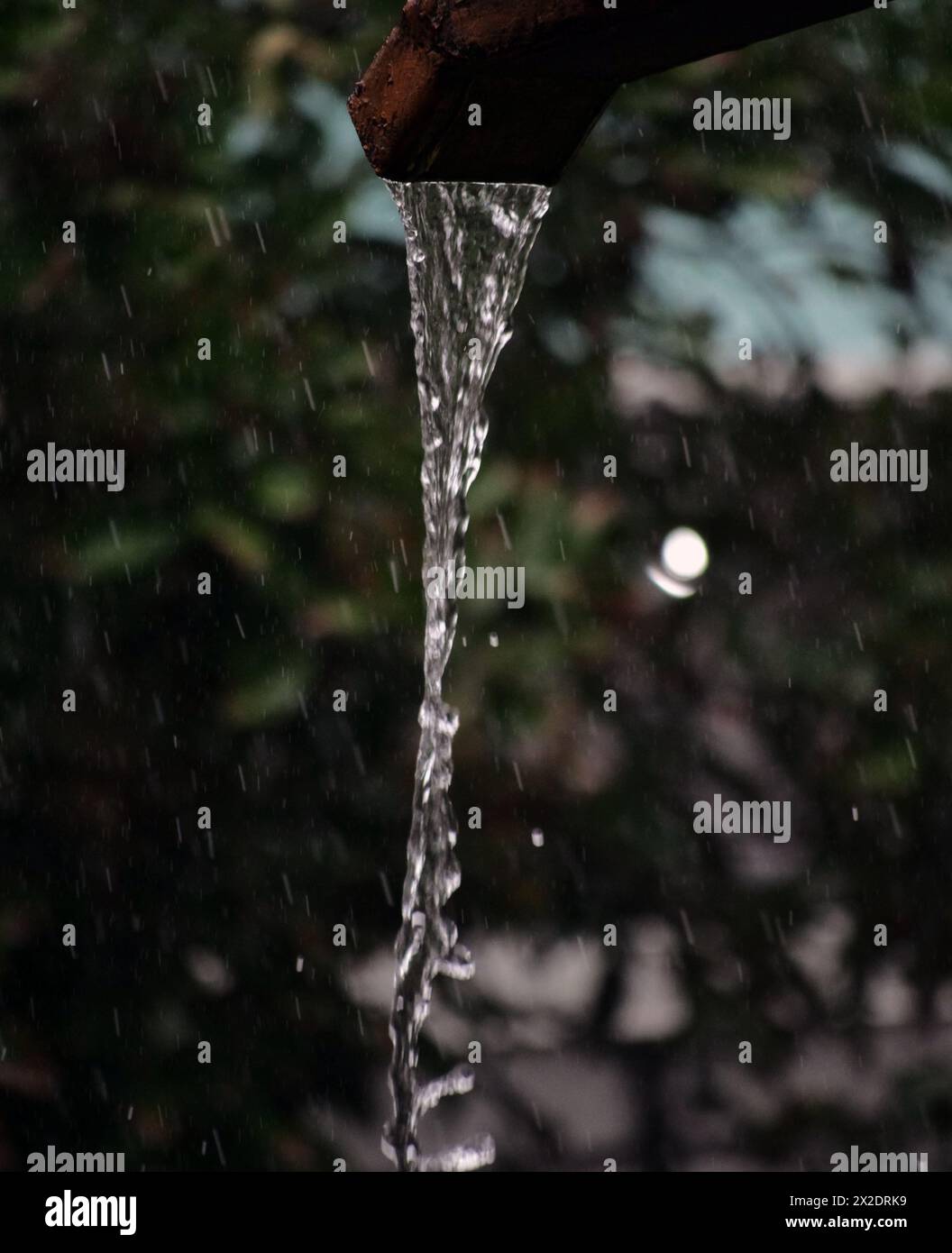 Rain water flows from pipe hi-res stock photography and images - Alamy