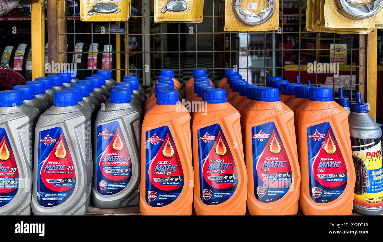 Assorted motor and engine oil bottles at a mechanic shop. Bekasi ...