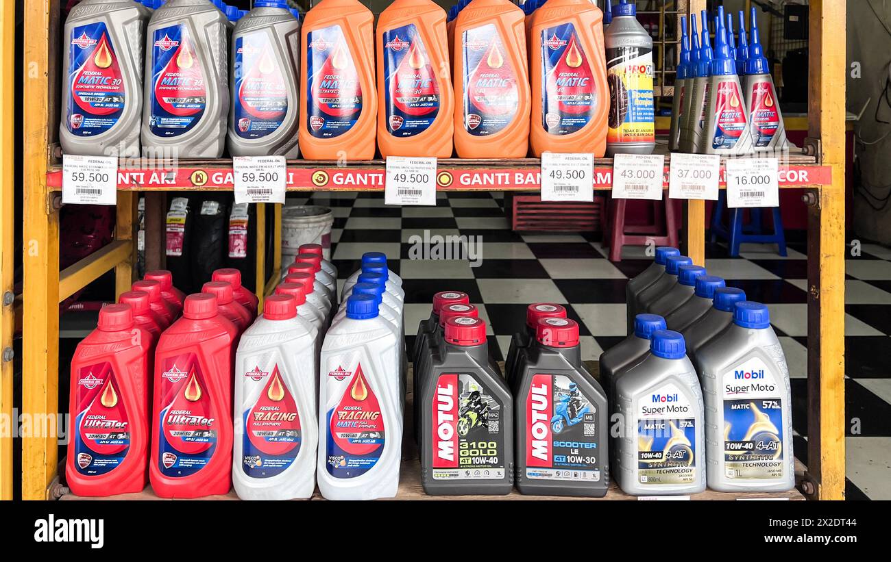 Assorted motor and engine oil bottles at a mechanic shop. Bekasi ...