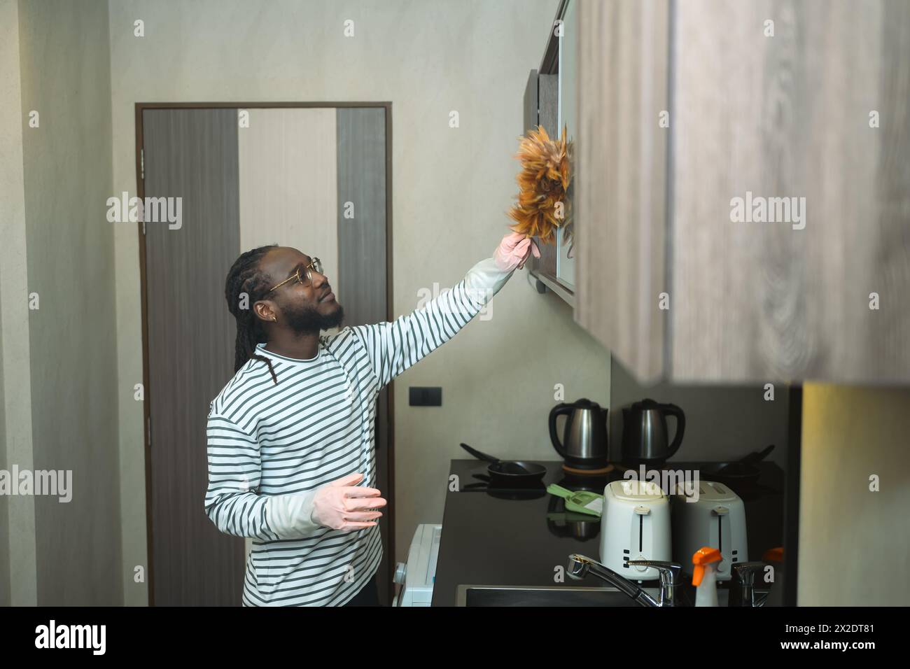 Wiping dust off hi-res stock photography and images - Alamy