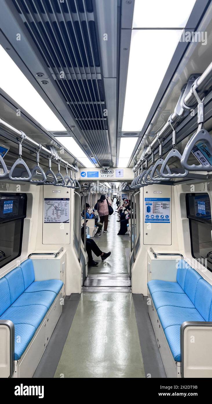 LRT Jakarta train interior seating area, departure station, bright ...