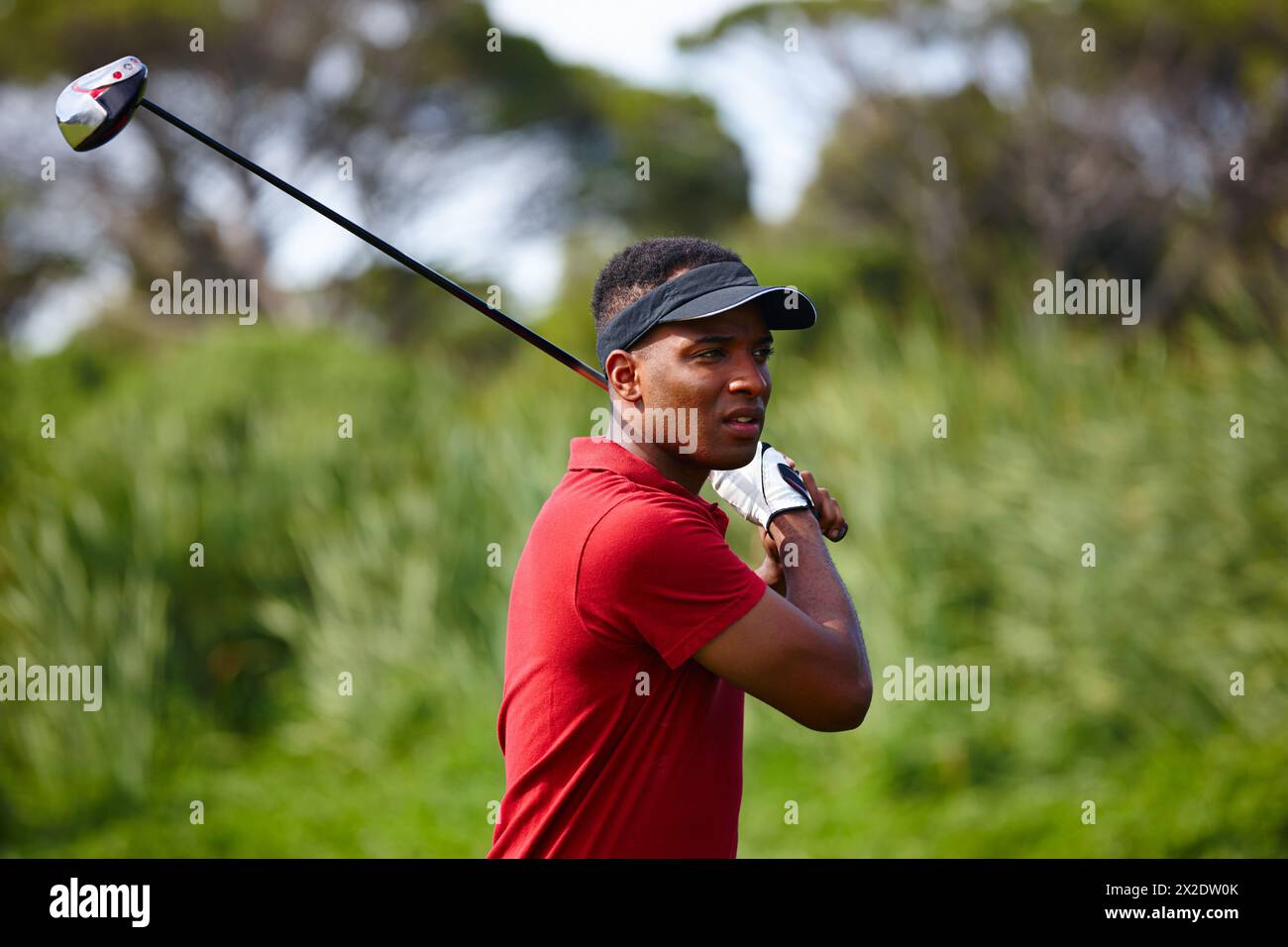 Black man, golf course and swing with club for point, score or par in ...
