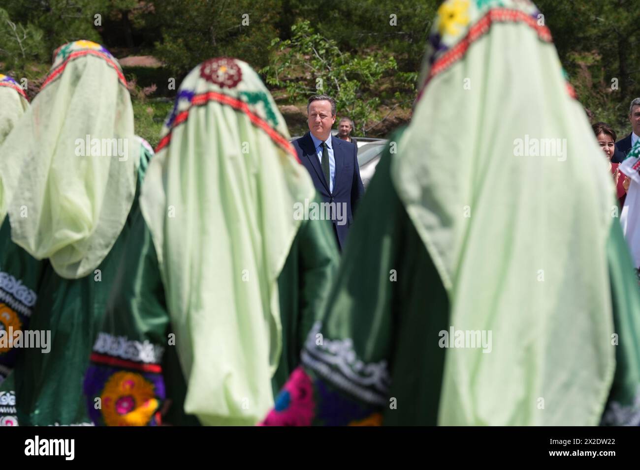 Foreign Secretary Lord David Cameron watches dancers as he arrives at ...