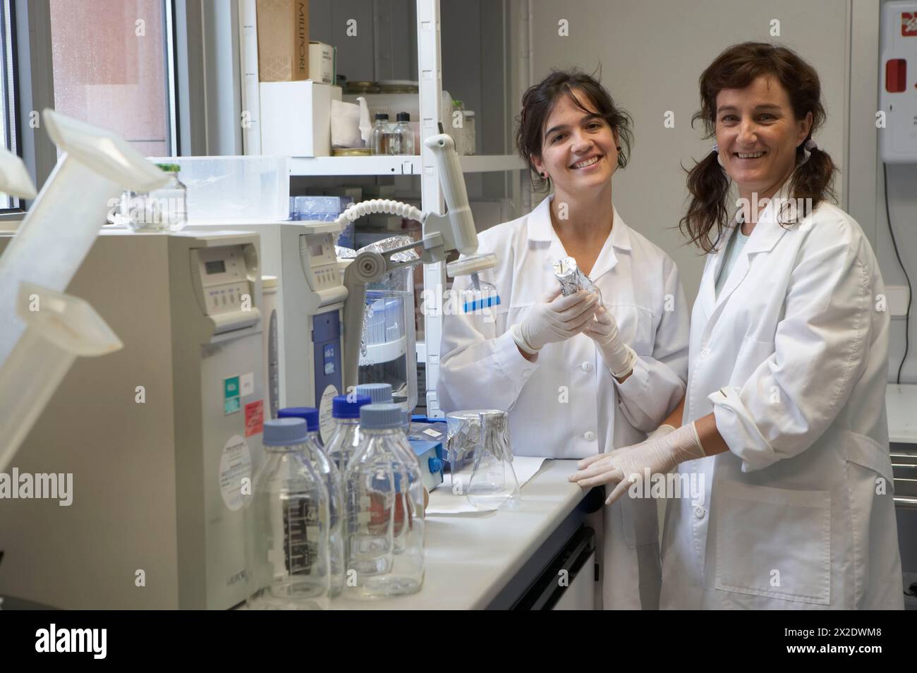 Technical staff working with the water purification equipment ...