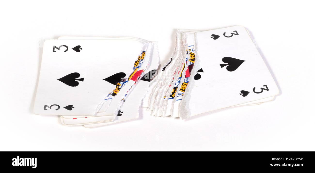 Playing card, torn in pieces, isolated on white Stock Photo - Alamy