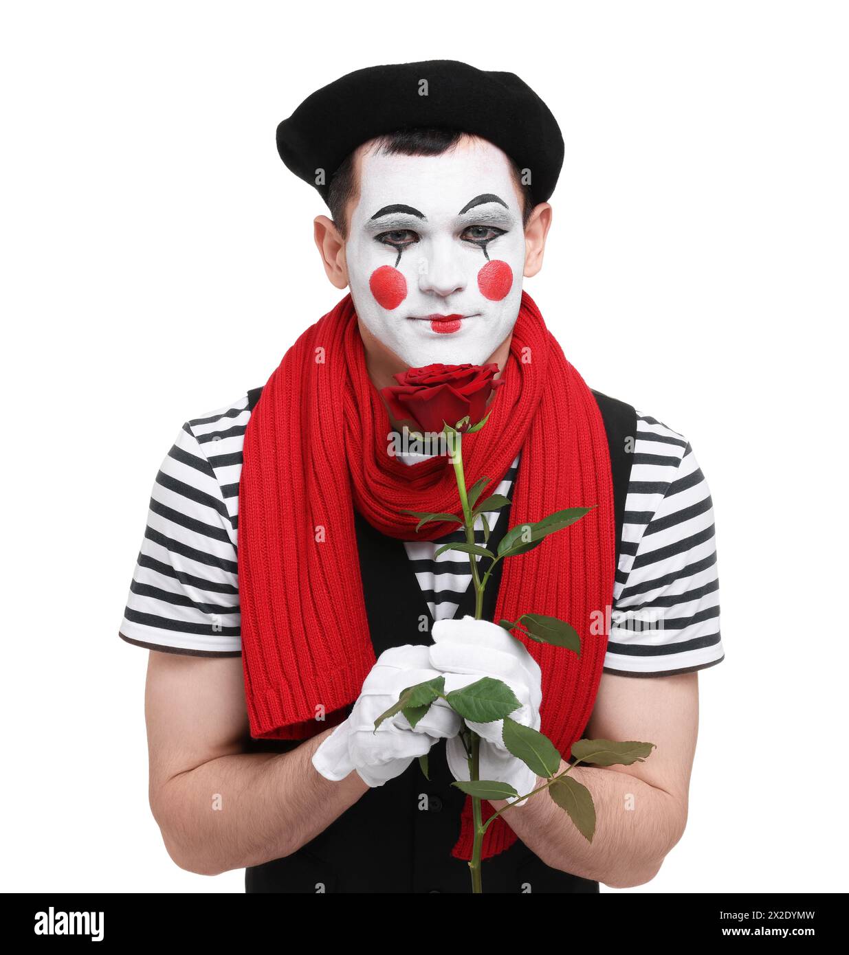 Funny mime artist with red rose on white background Stock Photo - Alamy