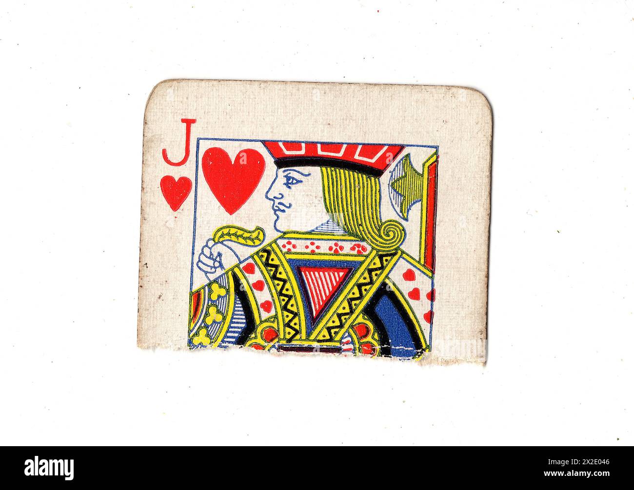 A torn half of a vintage, well used jack of hearts playing card ...