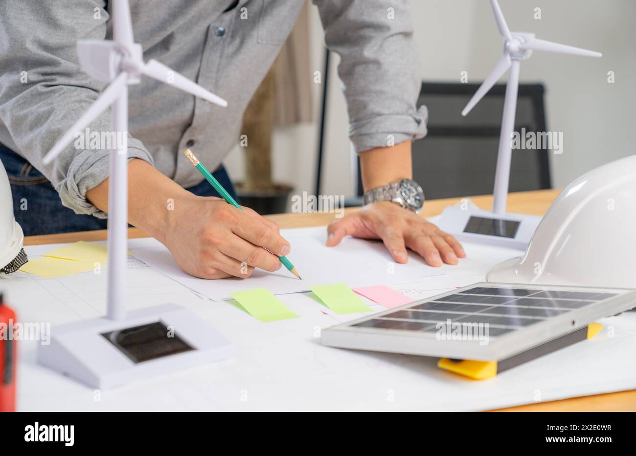 The engineer is designing an energy-efficient house Stock Photo - Alamy