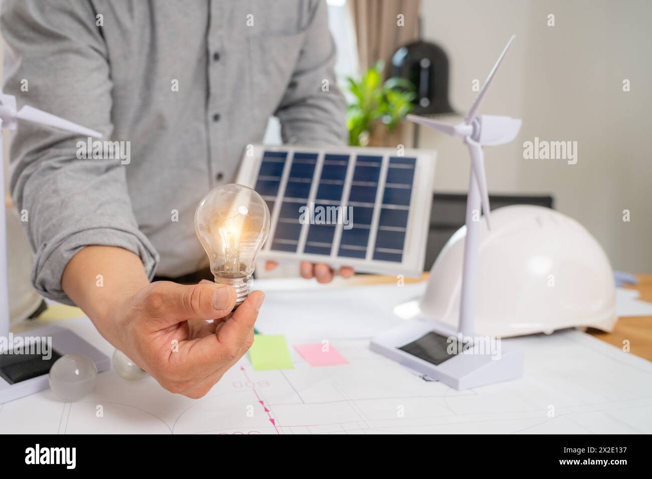 The engineer is designing an energy-efficient house Stock Photo - Alamy