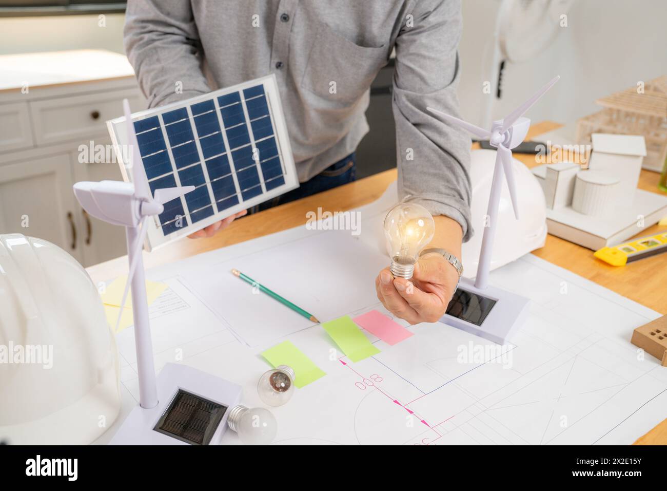 The engineer is designing an energy-efficient house Stock Photo - Alamy