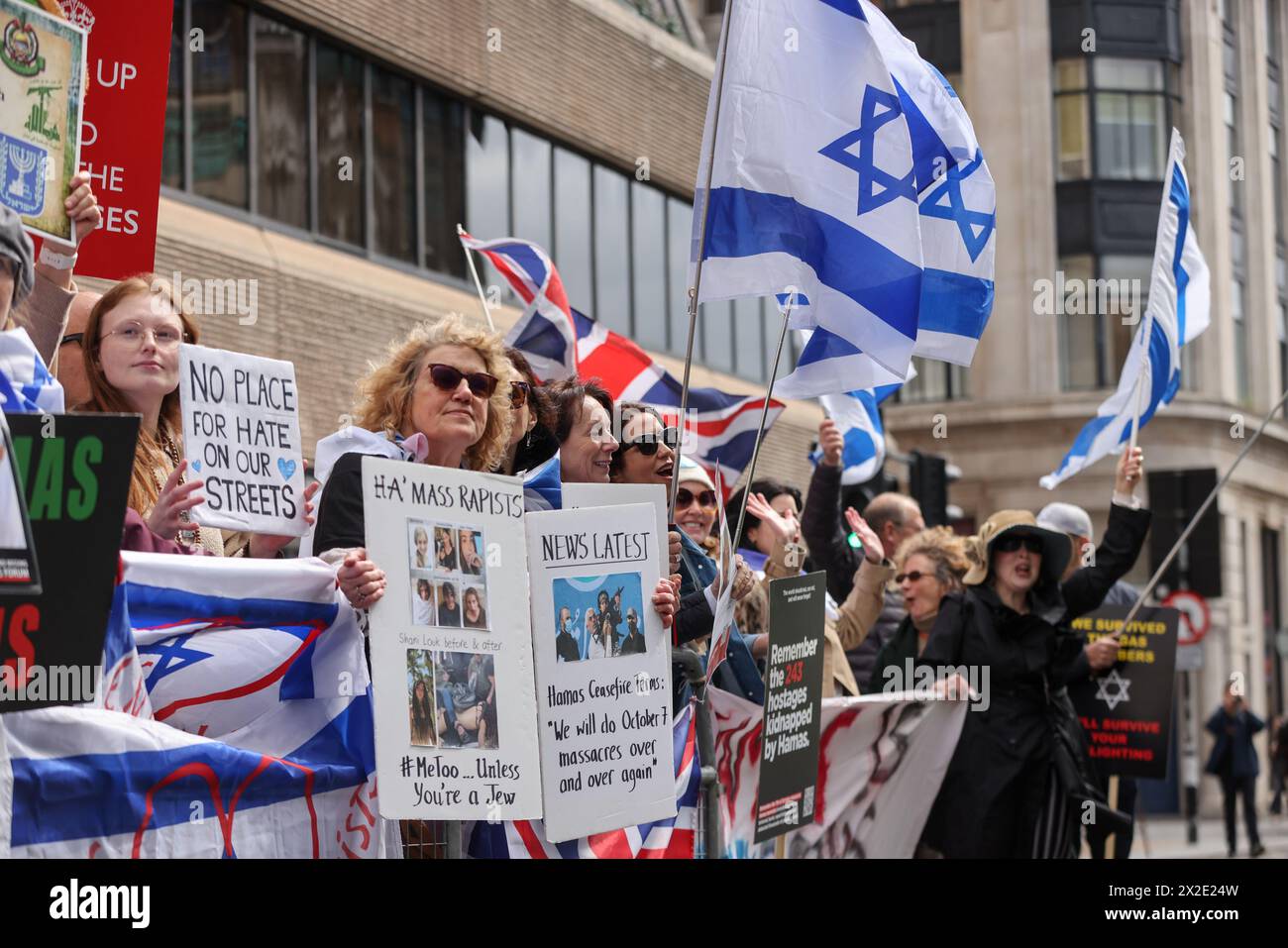 London, UK. 20th Apr, 2023. Pro-Israel supporters hold placards and ...