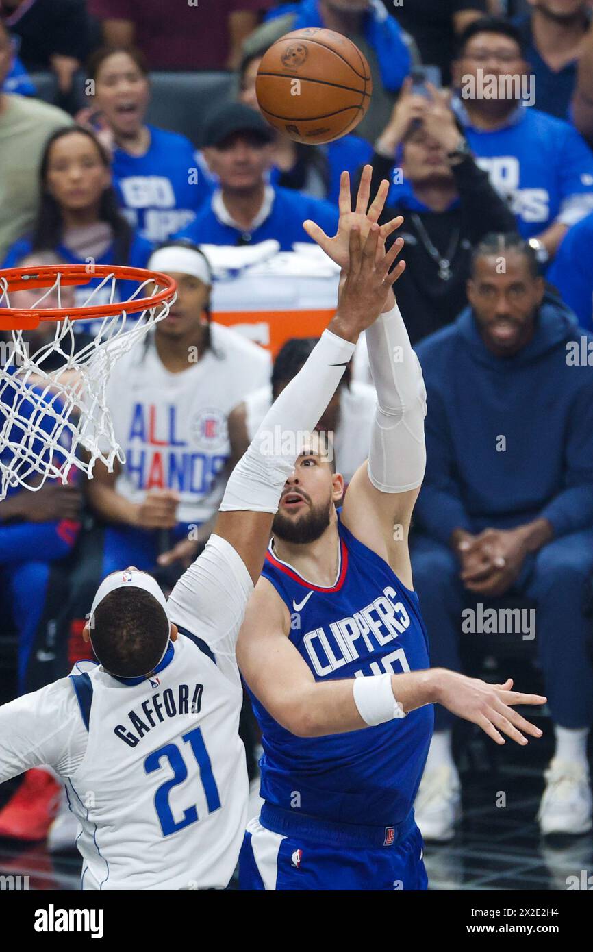 Los Angeles, USA. 21st Apr, 2024. Los Angeles Clippers' Ivica Zubac (R ...