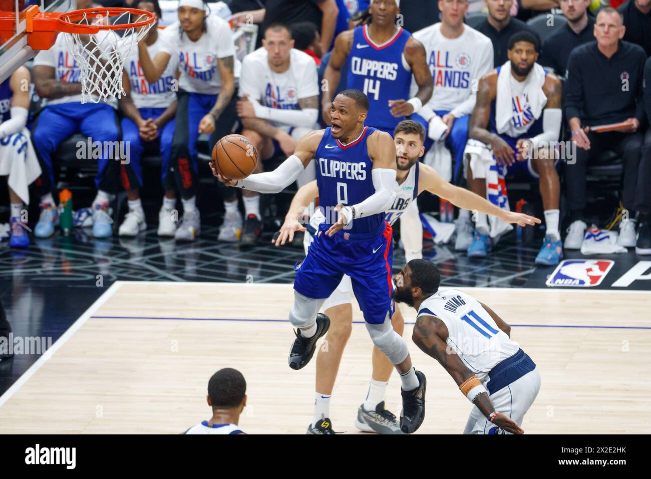 Los Angeles, USA. 21st Apr, 2024. Los Angeles Clippers' Russell Westbrook (C) goes for a layup ...