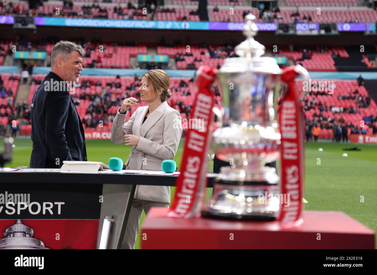London, UK. 21st Apr, 2024. The FA Cup Trophy with ITV presenter Karen ...