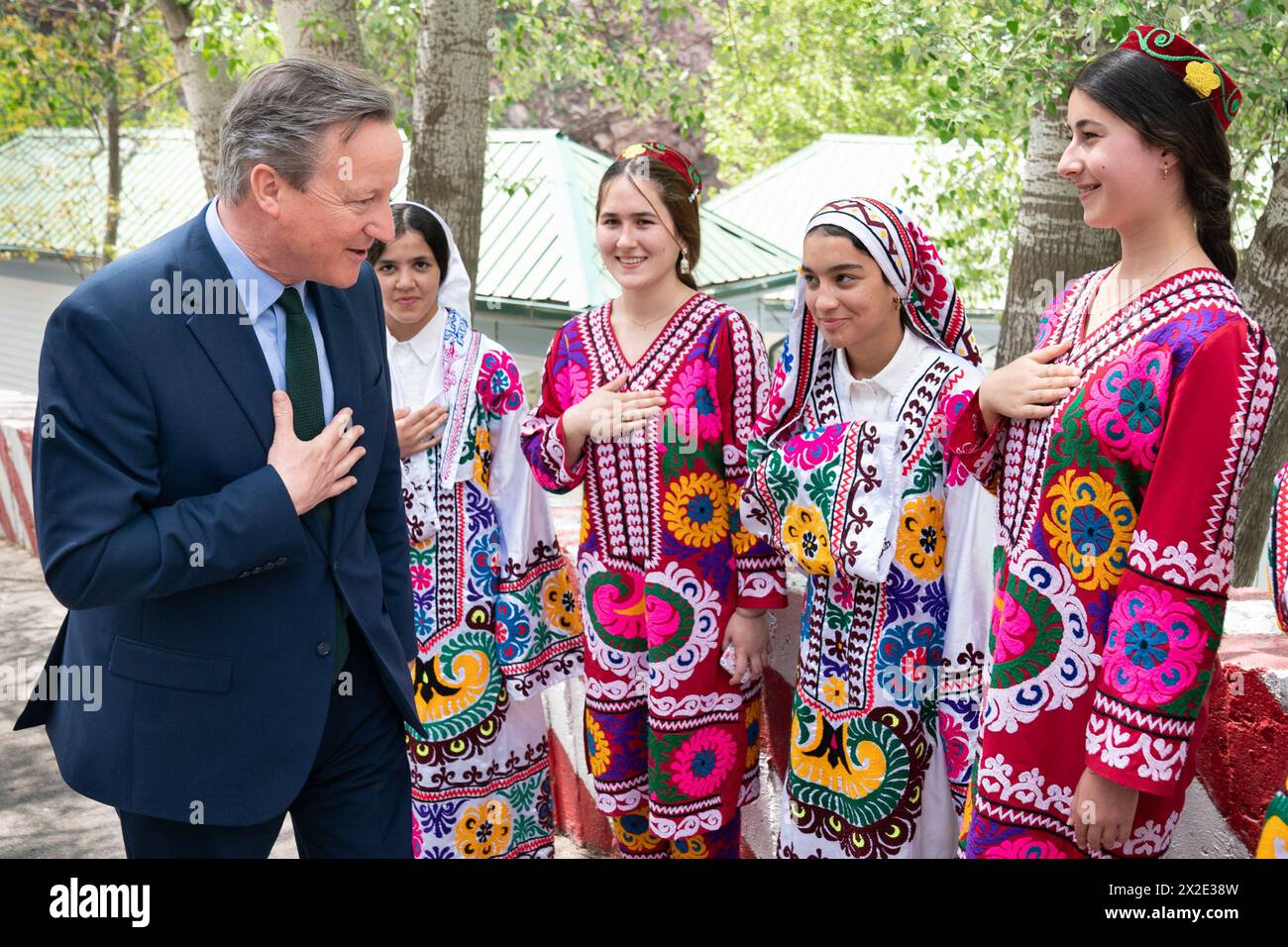 Foreign Secretary Lord David Cameron meets traditional dancers at the ...