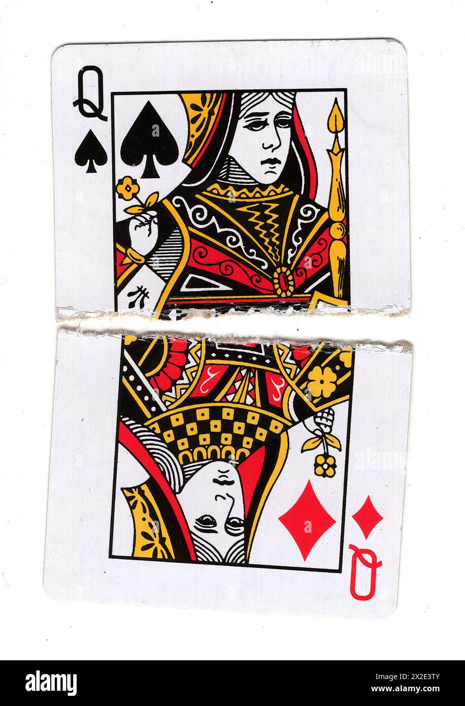 Torn halves of vintage playing cards showing a queen of spades and ...