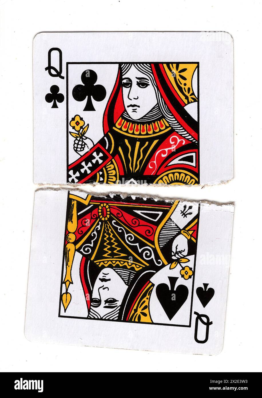 Torn halves of vintage playing cards showing a queen of clubs and ...