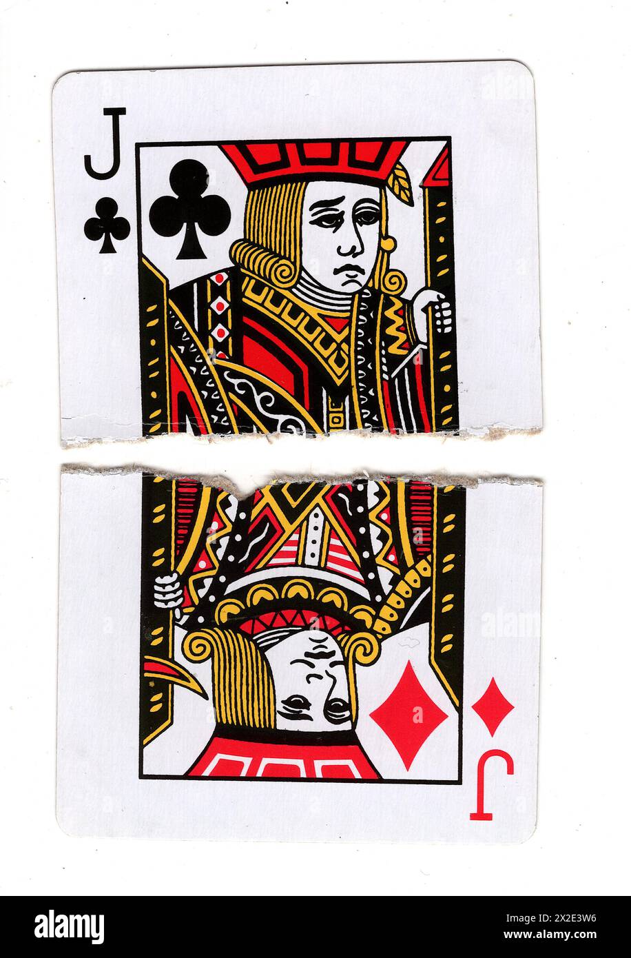 Torn halves of vintage playing cards showing a jack of clubs and ...