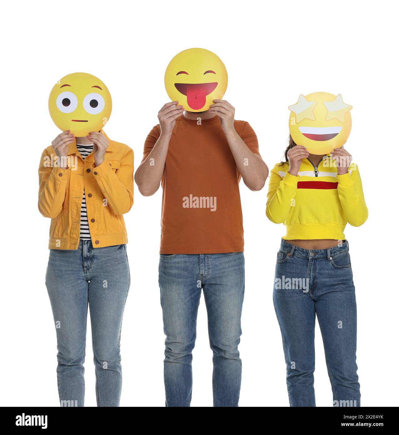 People covering faces with emoticons on white background Stock Photo ...