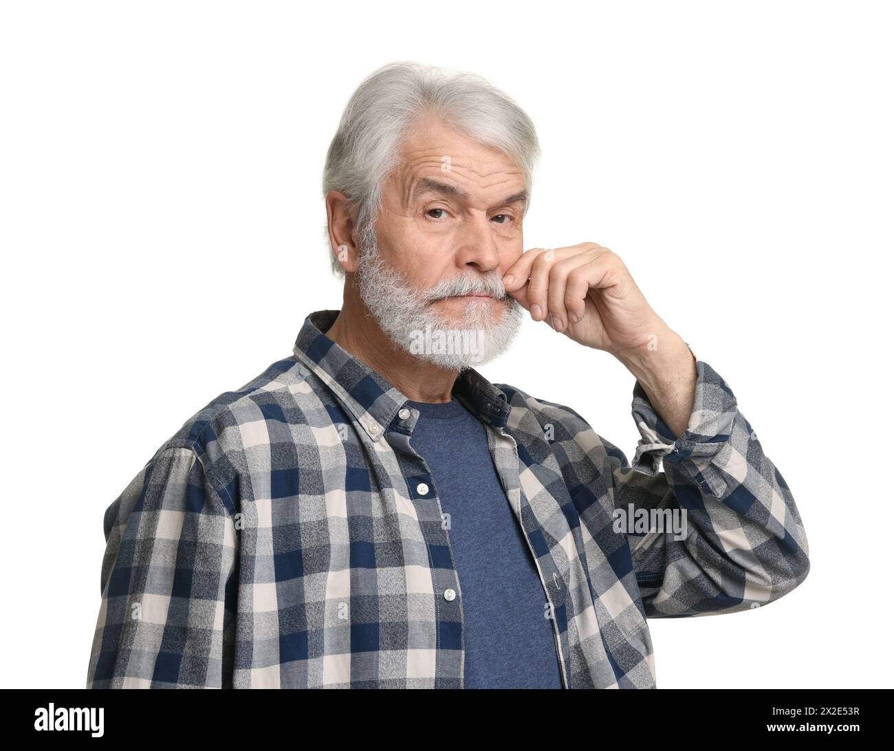Senior man touching mustache on white background Stock Photo - Alamy