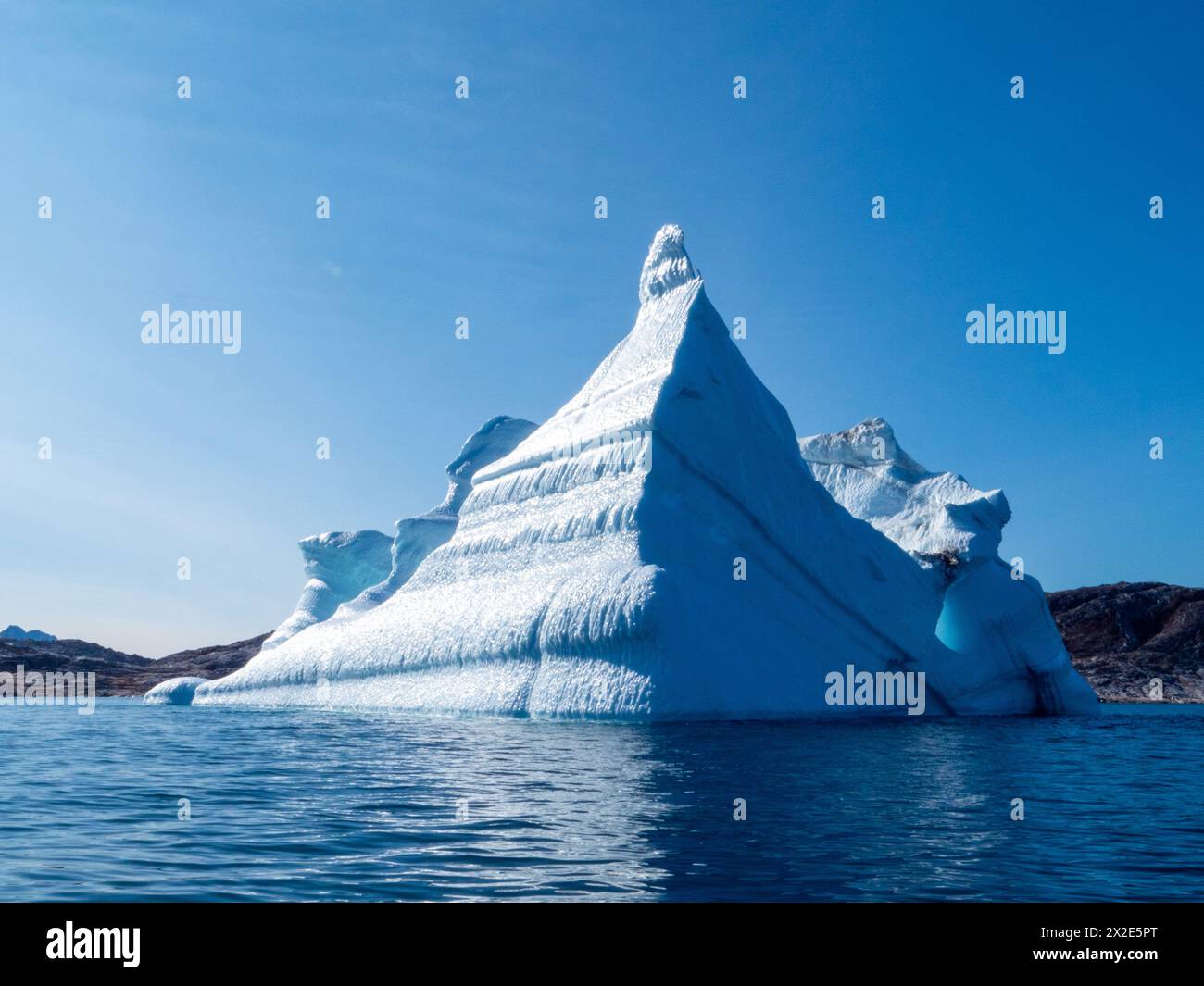 Iceberg in the Ikaasatsivaq Fjord in East Greenland. The iceberg is ...
