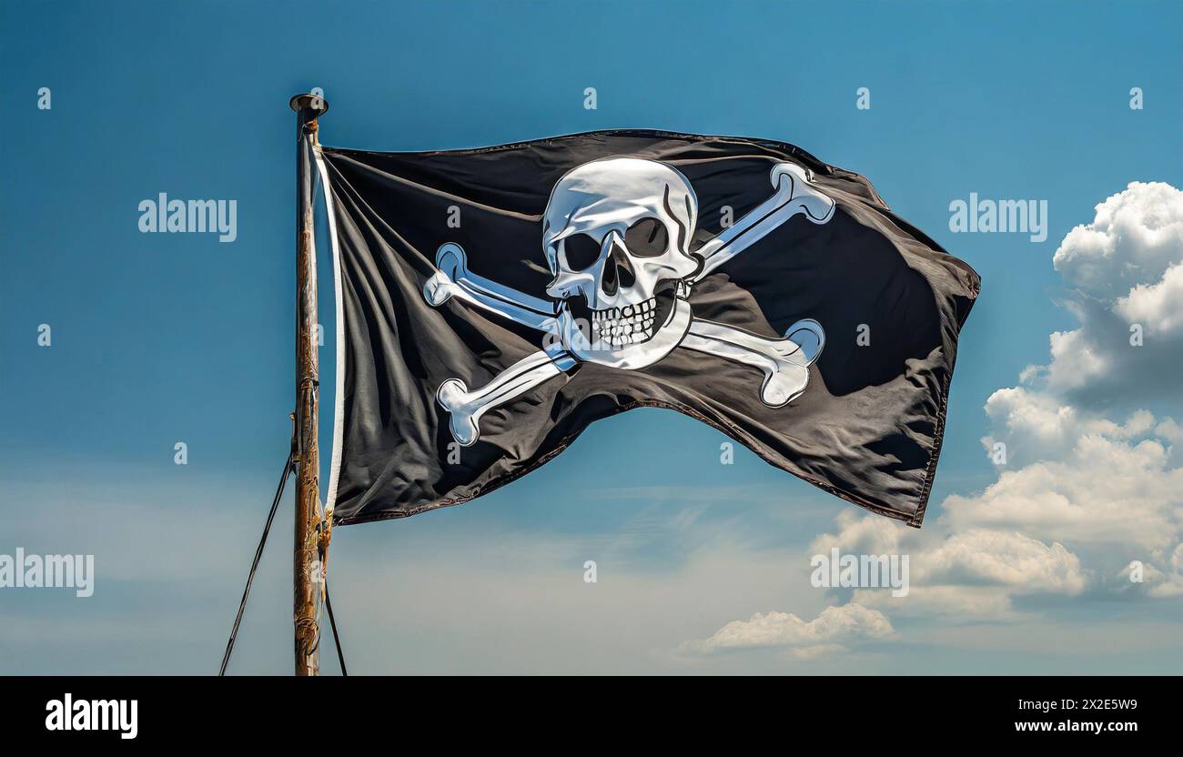 Die Piratenflagge flattert im Wind, isoliert, gegen den blauen Himmel ...