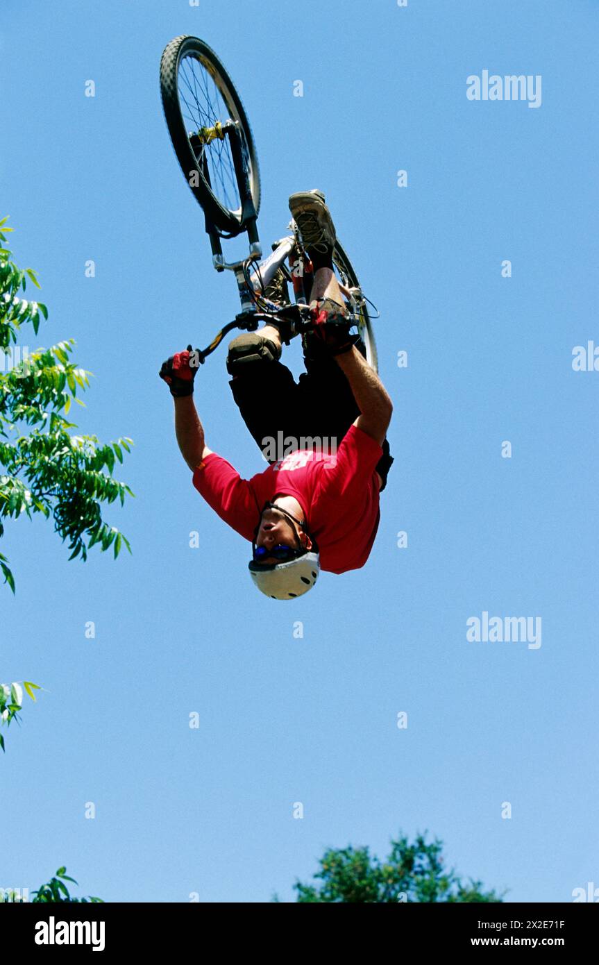 Biker doing a back flip Stock Photo - Alamy