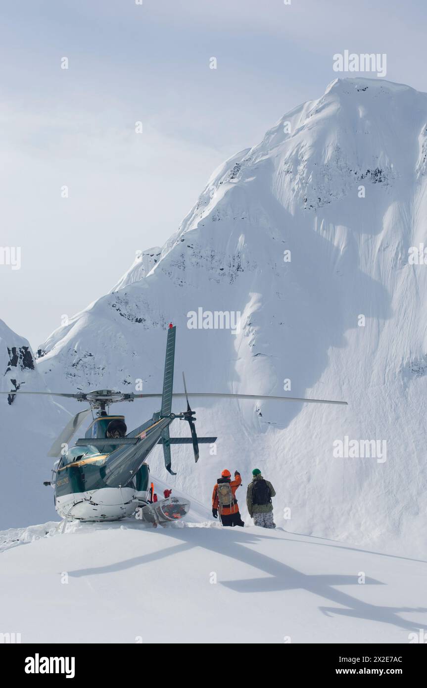 Men scoping a line next to the helicopter while filming with Matchstick ...