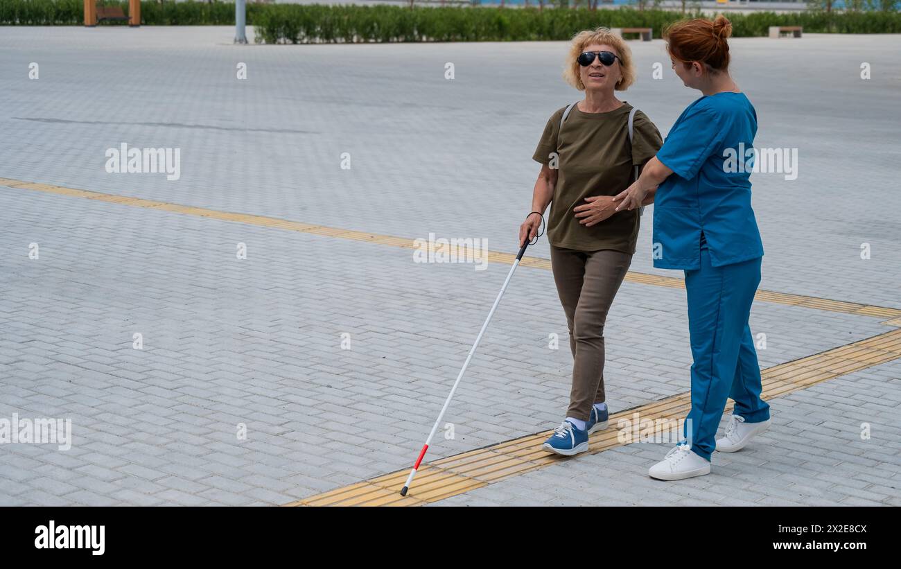Nurse elderly blind woman hi-res stock photography and images - Alamy